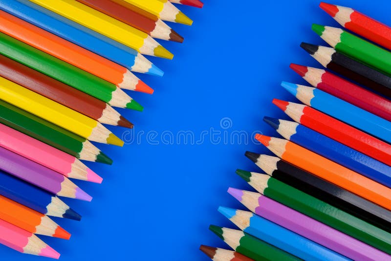 Colored Pencils on Blue Background with Reflection Stock Photo - Image ...