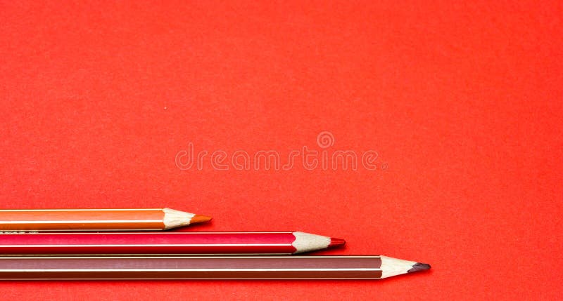 Colored Pencils on a Bright Red Background Stock Photo - Image of ...