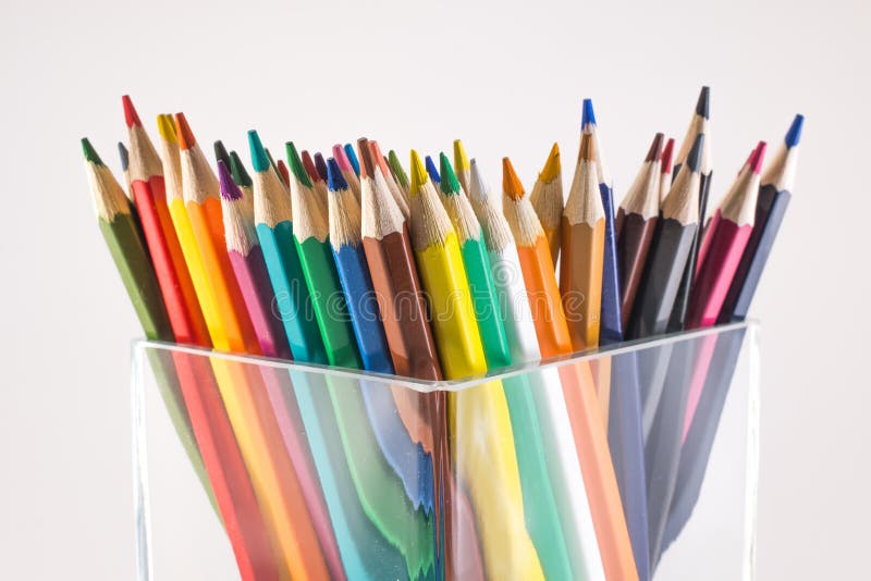 Colored pencils in a glass stock photo. Image of glass - 70325860