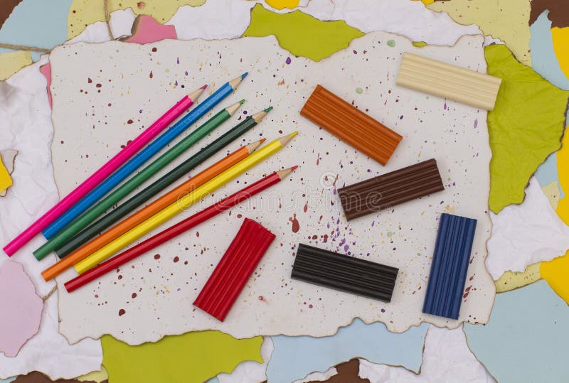 Colored Pencils and Modeling Clay on Cardboard Stock Photo - Image of ...