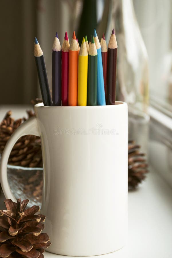 Colored pencils in mug stock image. Image of interior - 56950131