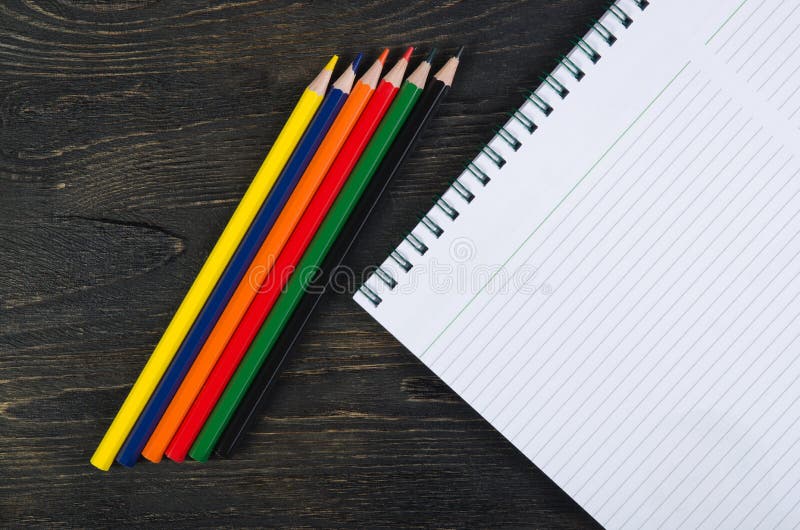 Colored Pencils and a Notebook Stock Photo - Image of crayon, copyspace ...