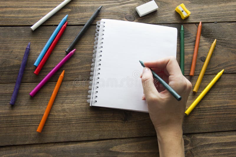 Colored Pencils , Notebook and Hand Stock Image - Image of group ...