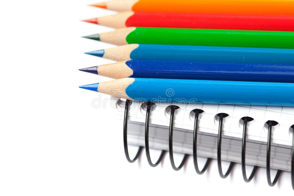 Colored Pencils and a Notebook Isolated on White Stock Photo - Image of ...