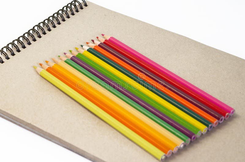 Colored Pencils on Notepad for Sketches Stock Photo - Image of multiple ...