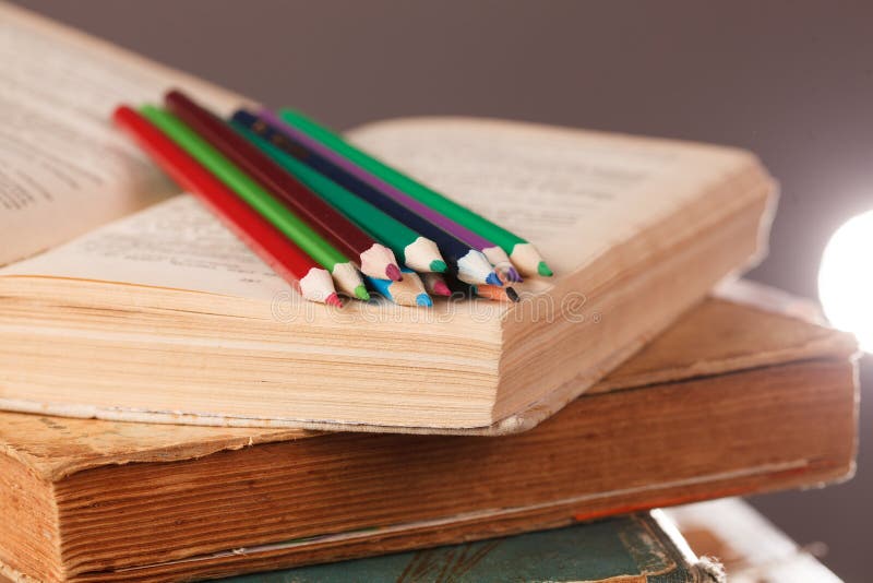 Colored Pencils on the Open Book. Stock Image - Image of object ...