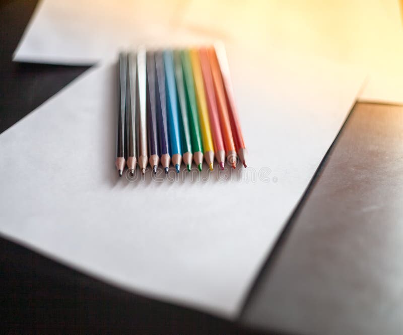 Colored Pencils are Prepared for Drawing on White Sheets of Paper in ...