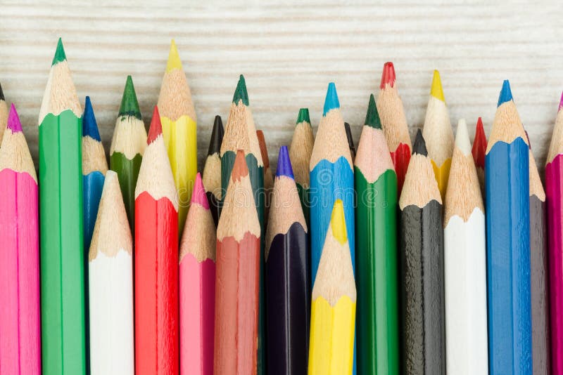 Colored pencils in a row stock photo. Image of object - 99812460