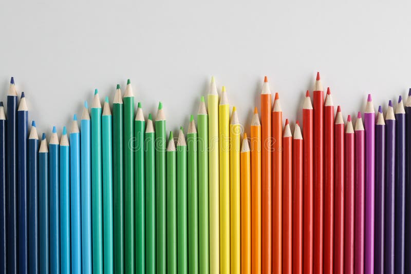 Colored Pencils Vertically in a Row in a Wave, Different in Height ...