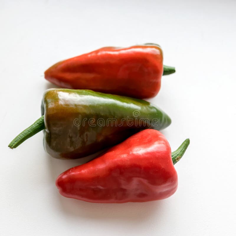 Colored Peppers on a Light Background Stock Image - Image of isolated ...
