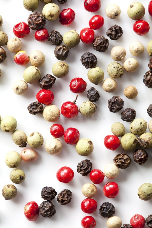 Pepper Mix. Black, Red, White, and Green Peppercorns on an Old Cutting ...
