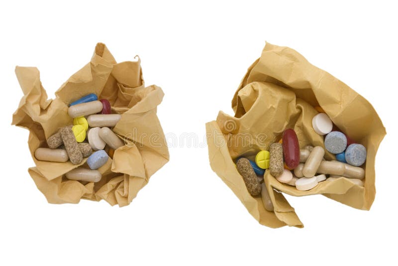 Colored Pills and Crumpled Paper Stock Photo - Image of isolated ...