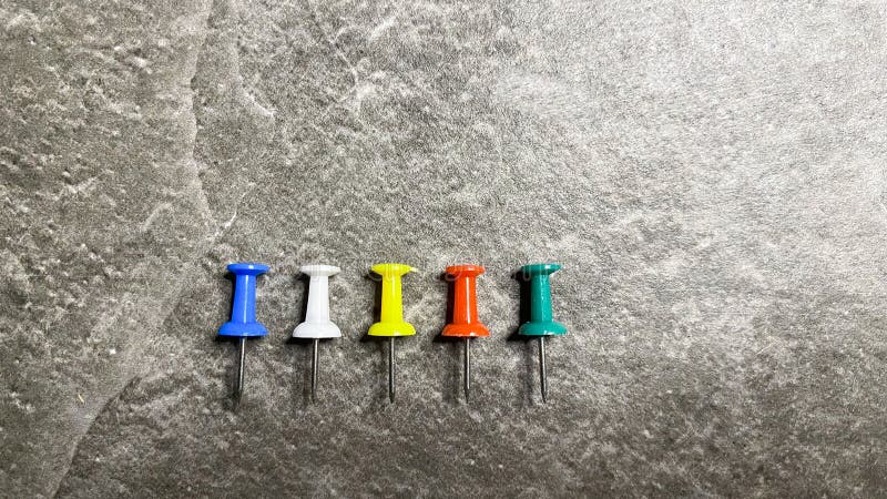 Colored Pins on a Black Background Stock Photo - Image of sharp, stone ...