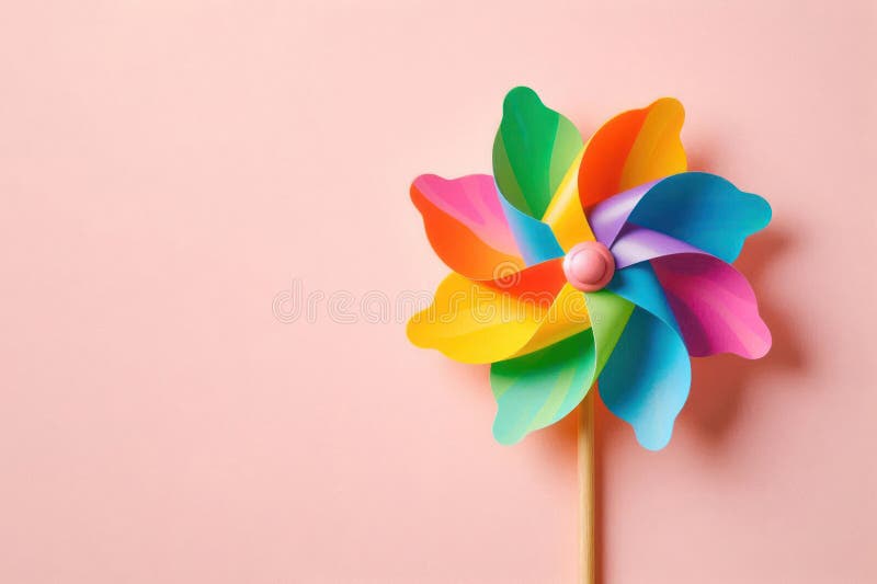Colored Pinwheel on a Pink Background. Space for Text. Stock Photo ...