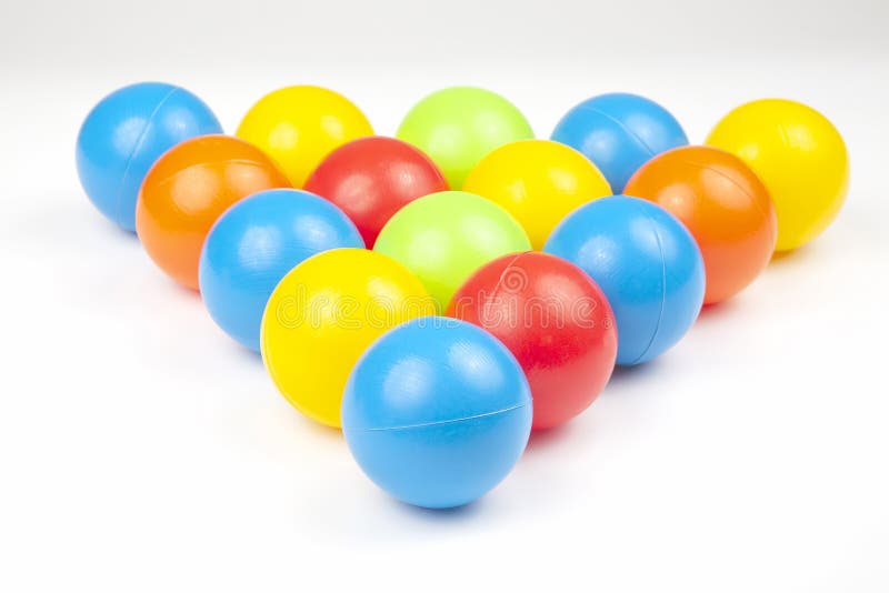 Colored Plastic Balls on White Background. Leisure and Game Items Stock ...