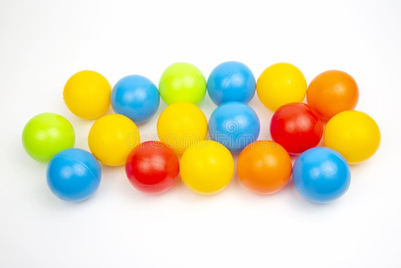 Colored Plastic Balls on White Background. Leisure and Game Items Stock ...