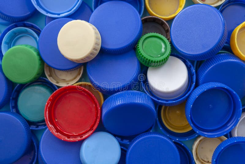Colored Plastic Bottle`s Covers , Top View. Plastic Trash Abstract ...