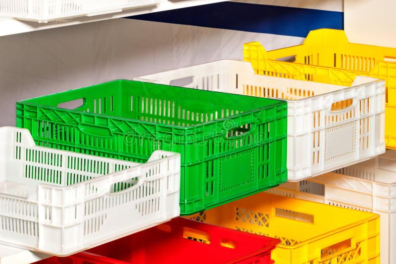 Colored Plastic Boxes on a Warehouse Shelf Stock Image - Image of ...