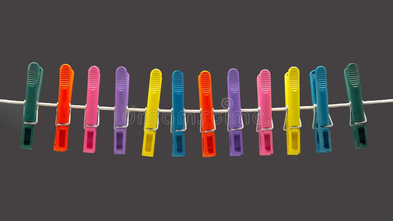 Colored Plastic Clothespins Hanging on a Rope Stock Photo - Image of ...