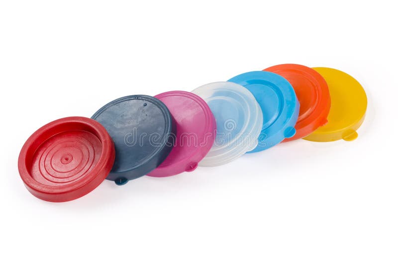 Colored Plastic Lids for Glass Jars on a White Background Stock Photo ...