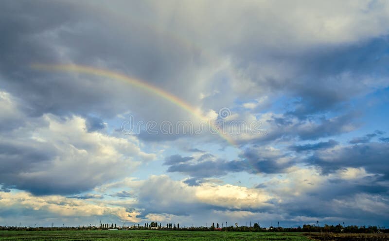 Colored Rainbows Over Blue Sky, Rainy Day Stock Photo - Image of nature ...