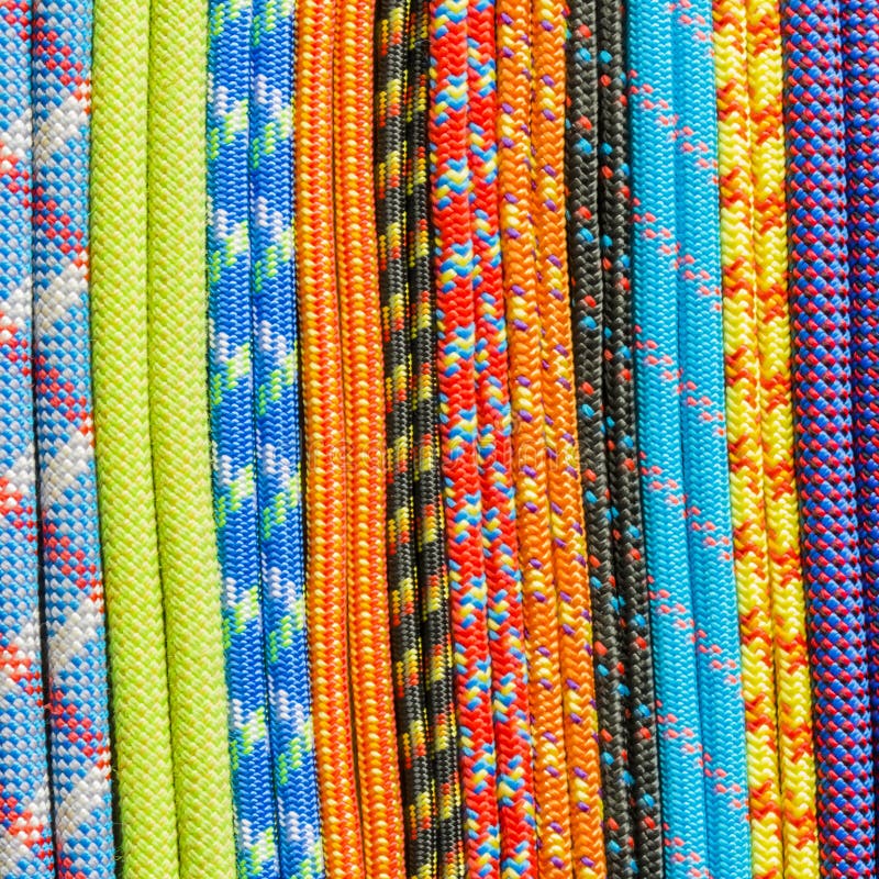 Colored ropes on the rock stock image. Image of equipment - 17090253