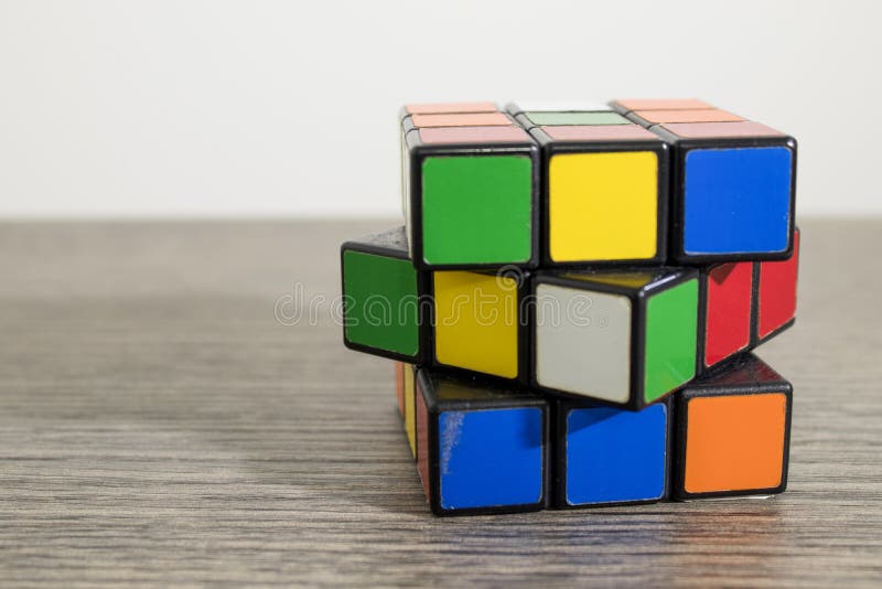 Colored Rubik Cube on a Decrated Wood Table Editorial Photo - Image of ...