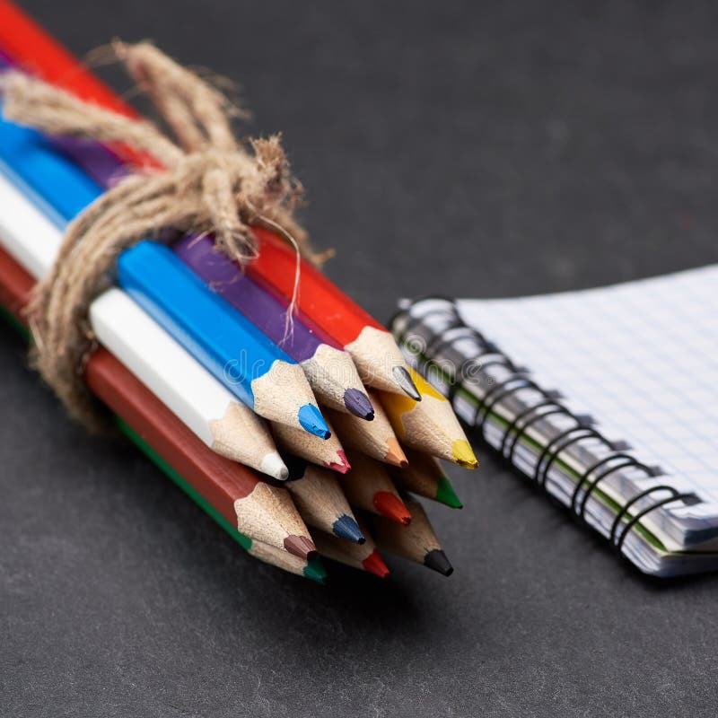 Colored Sharpened Pencils Tied with a Rope Close-up on the Background ...