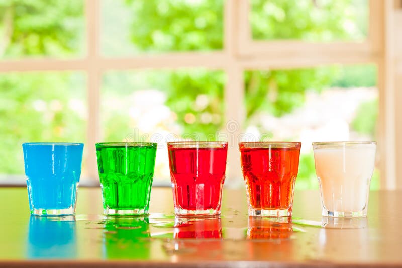 Colored shots glass stock photo. Image of beverage, blue - 114549746