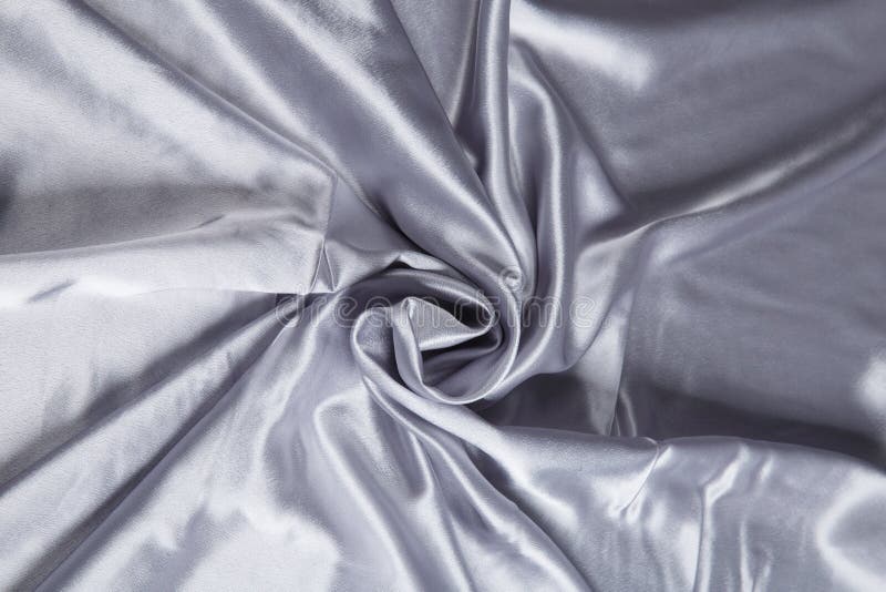 Colored Silver Textile Satin Fabric Folded in Folds and Waves with ...
