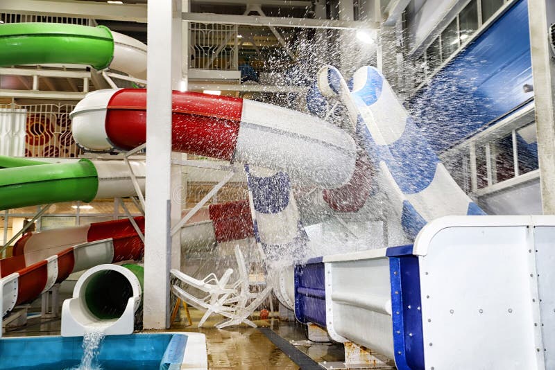 Colored Slides in the Indoor Water Park Stock Image - Image of blue ...
