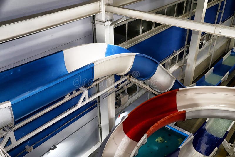 Colored Slides in the Indoor Water Park Stock Photo - Image of pool ...