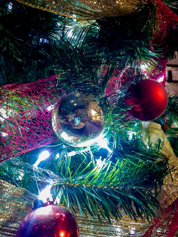 Colored Spheres on Christmas Tree with Lights Close-ups Stock Image ...