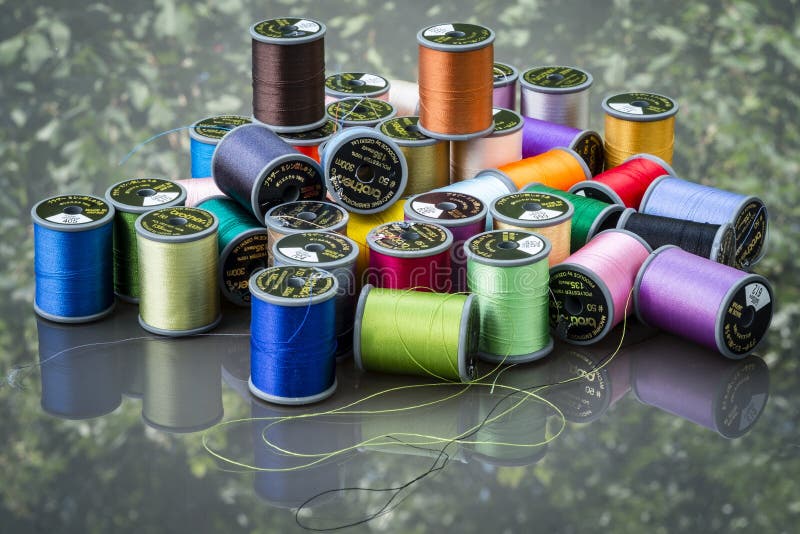 Colored spools of thread editorial photo. Image of sewing - 97544981