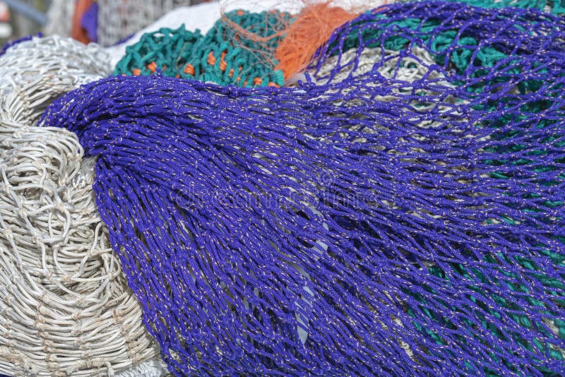 Colored Stacked Fishing Nets in Port Stock Photo - Image of nylon ...