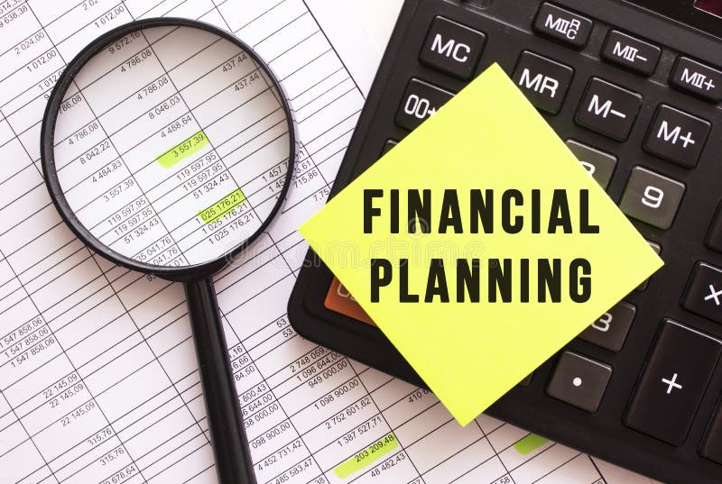 A Colored Sticker with the Text FINANCIAL PLANNING Lies on the ...