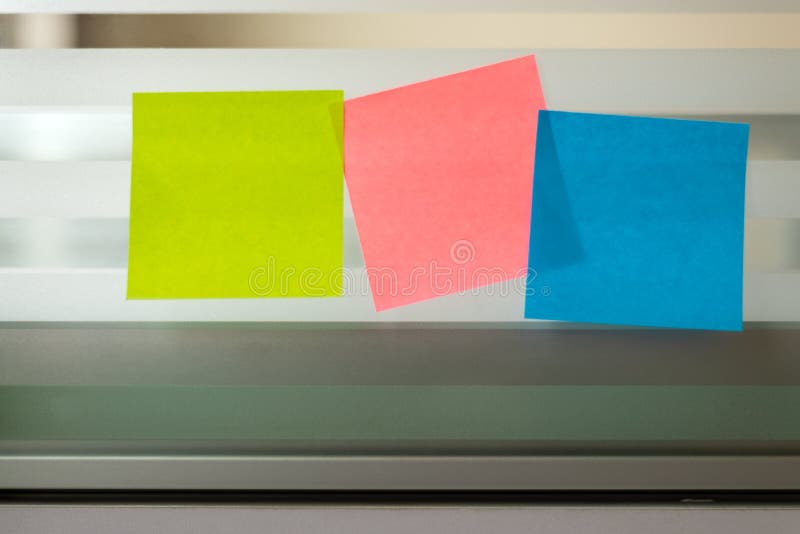 Colored Sticky Notes Over Glass Screen of a Bench Desk Stock Photo ...