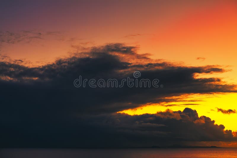 Sunset with dark clouds stock photo. Image of romantic - 231294438