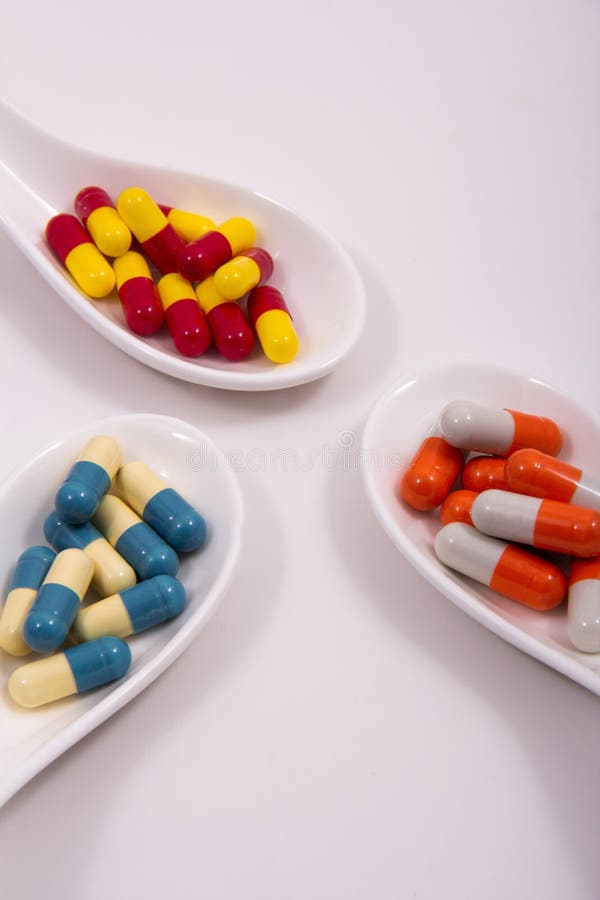 Colored Tablets and Capsules are Removed from the Package. Colored ...