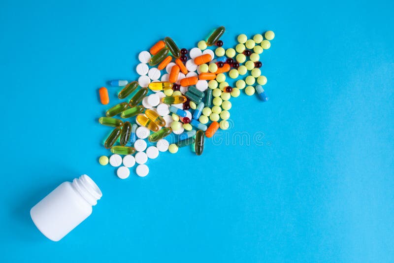 Colored Tablets in Plastic Container Top View Stock Photo - Image of ...