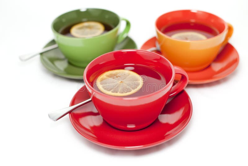 Colored Tea Cups with Tea and Lemon Stock Photo - Image of designer ...