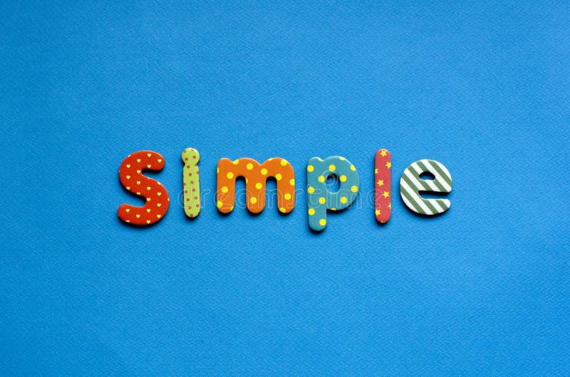 Colored Text Simple on Blue Paper Background. Stock Photo - Image of ...