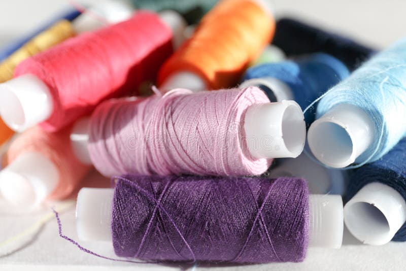 Colored Thread. Pink and Purple on the Foreground. All Colors of the ...