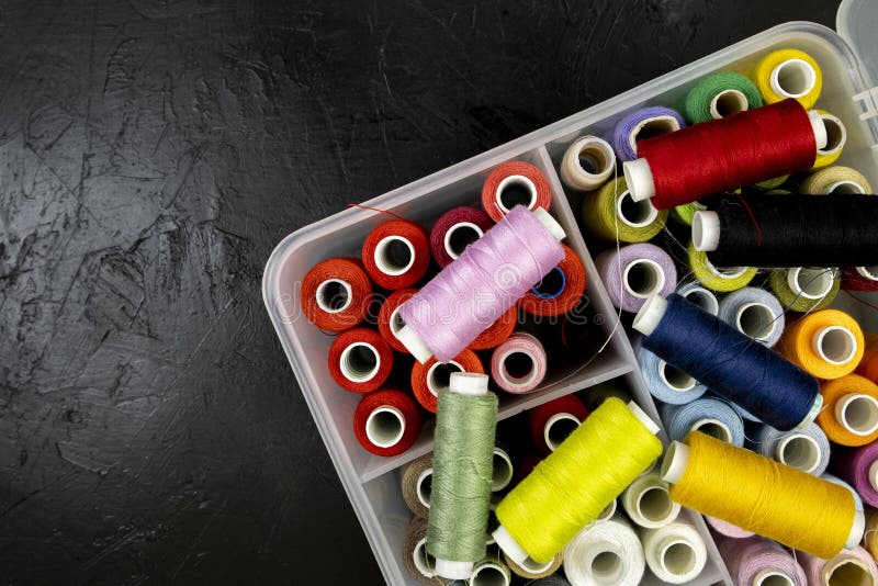 Colored Threads on an Black Background, Top View, Space for Text, Copy ...