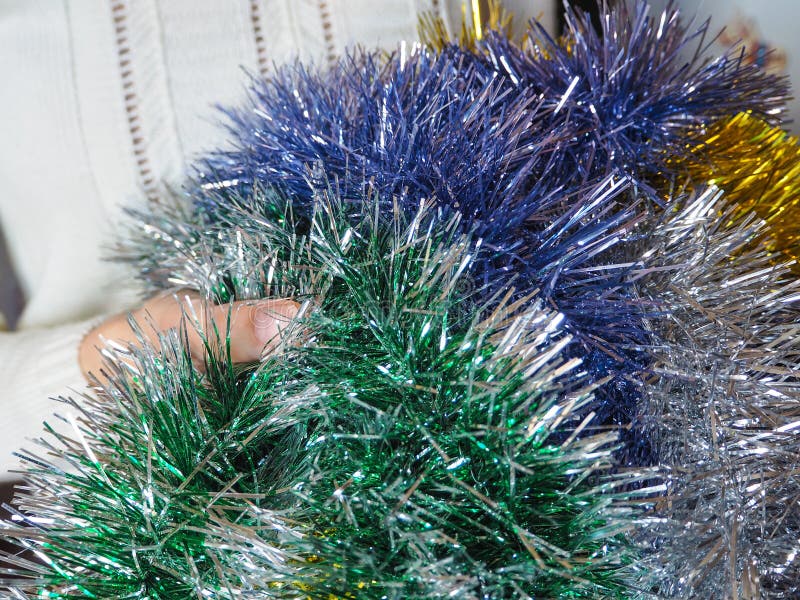 Colored Tinsel in Woman Hands. Stock Photo - Image of glitter ...