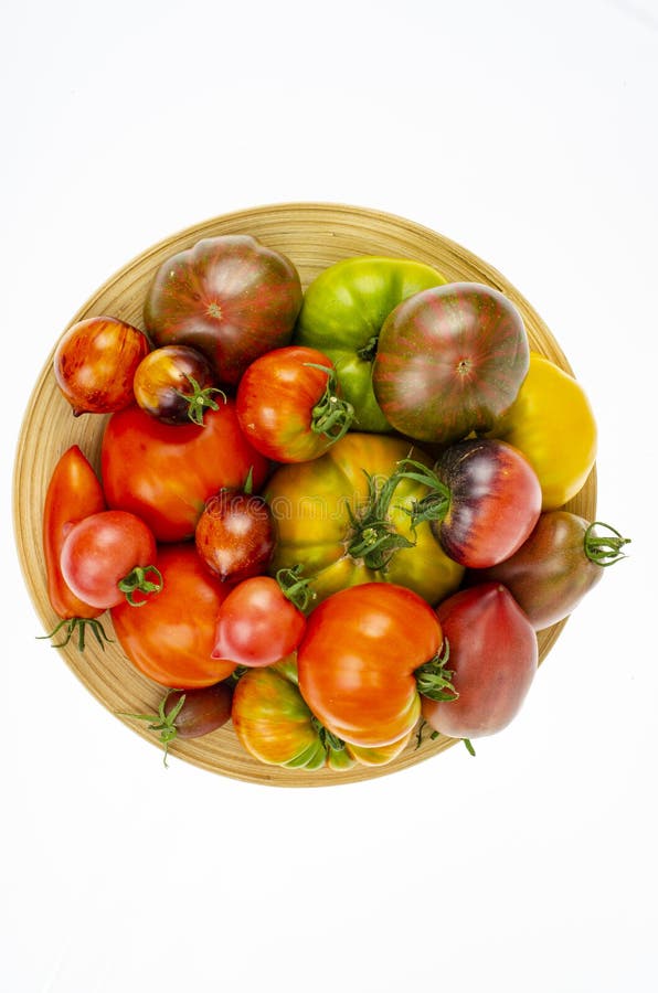 Colored Tomatoes of Different Varieties on White Background. Studio ...