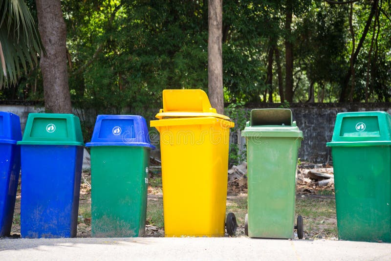 Colored trash containers stock photo. Image of bins - 289231796
