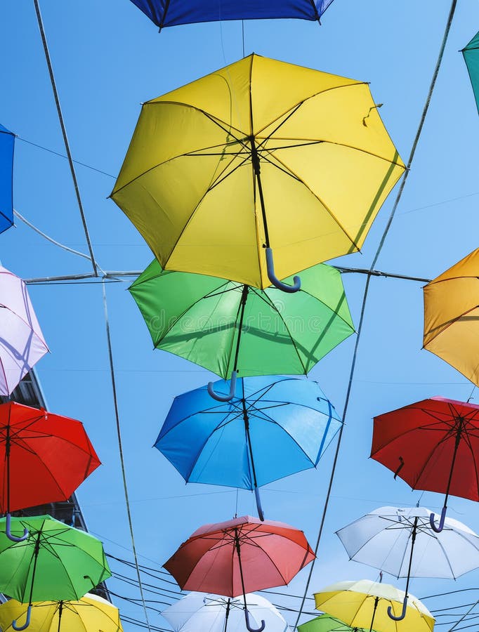 Colored umbrellas stock image. Image of summer, umbrella - 144217277