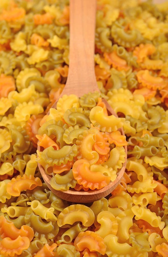 Colored Uncooked Italian Pasta in a Spoon Stock Photo - Image of ...