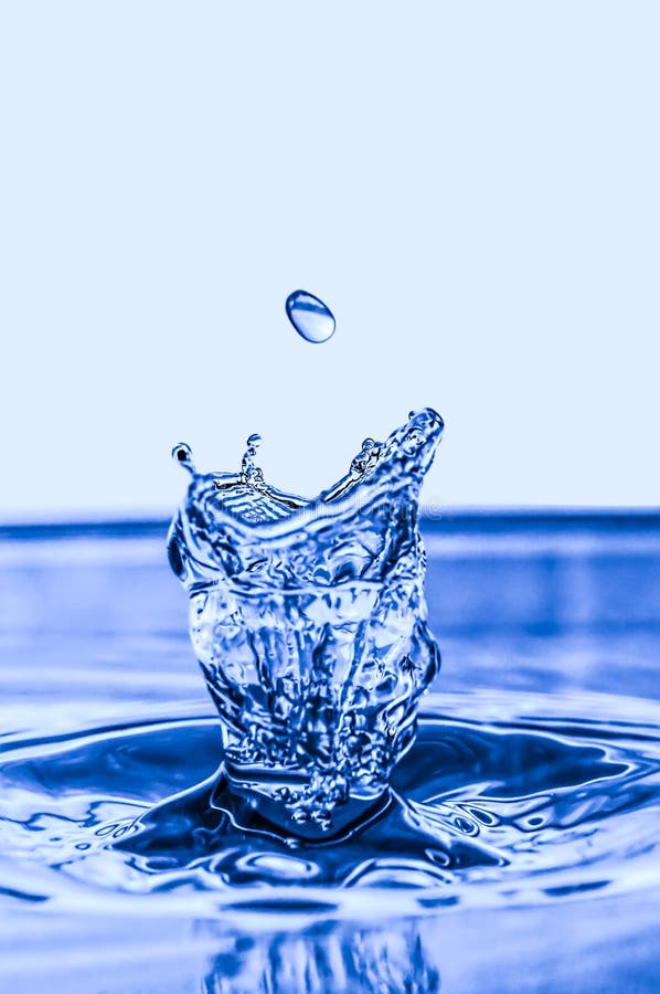 Colored water drop stock image. Image of reflection - 290488907